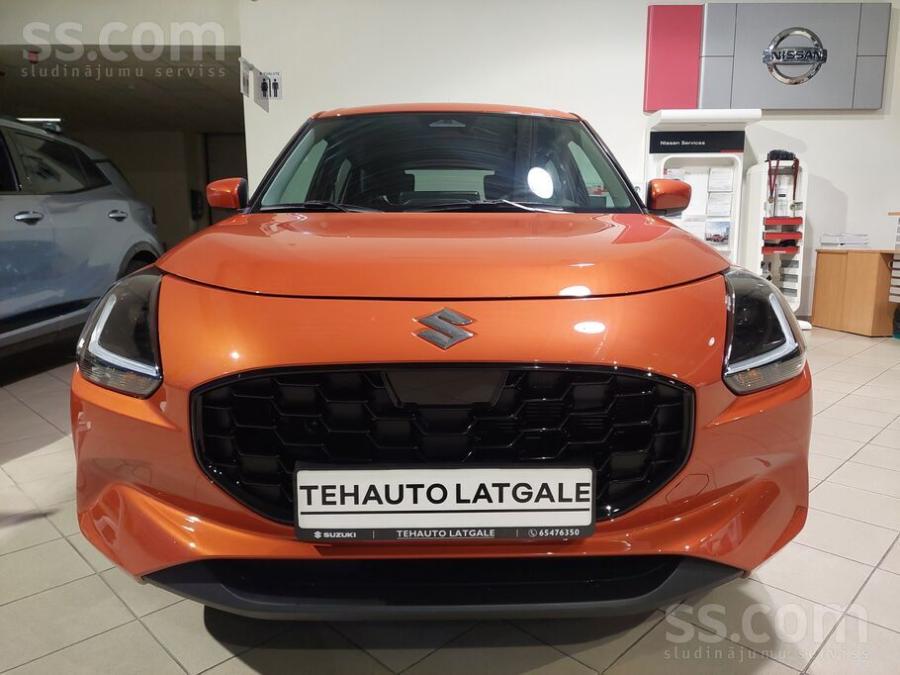 Orange Suzuki Swift 2026 in Daugavpils, with an engine capacity of 1.20 L and mileage of 10 thousand km for 18990 €, photo 2 on AUTOMOTO.COM.LV