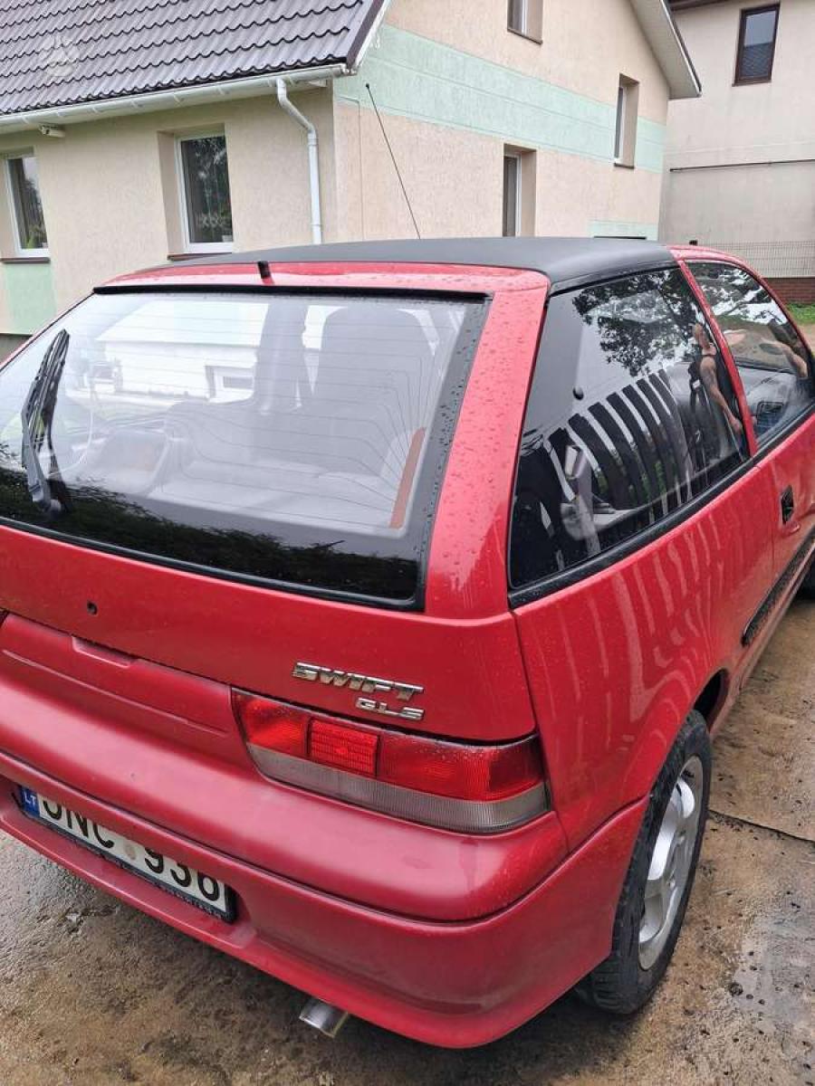 Red Suzuki Swift 2002 in Vilnius, with an engine capacity of 1.00 L and mileage of 97 thousand km for 750 €, photo 8 on AUTOMOTO.COM.LV