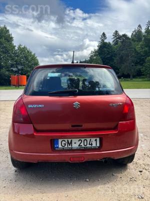 Red Suzuki Swift 2007 in Aluksne, with an engine capacity of 1.30 L and mileage of 184 thousand km for 1150 €, photo 3 on AUTOMOTO.COM.LV