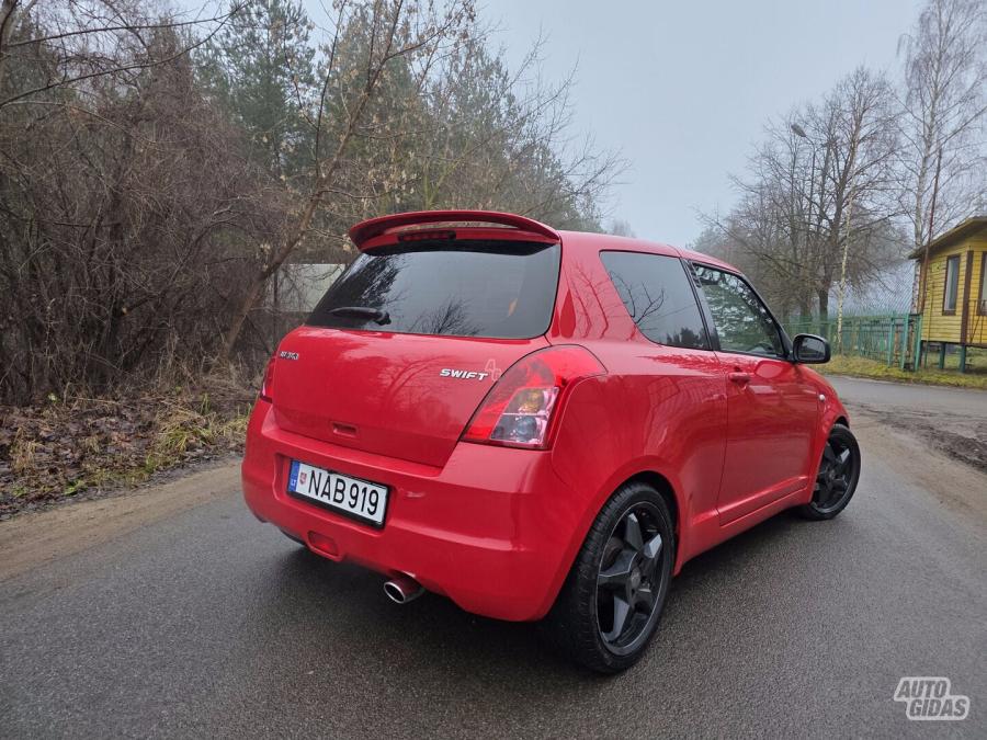 Red Suzuki Swift 2010 in Vilnius, with an engine capacity of 1.30 L and mileage of 250 thousand km for 2000 €, photo 3 on AUTOMOTO.COM.LV