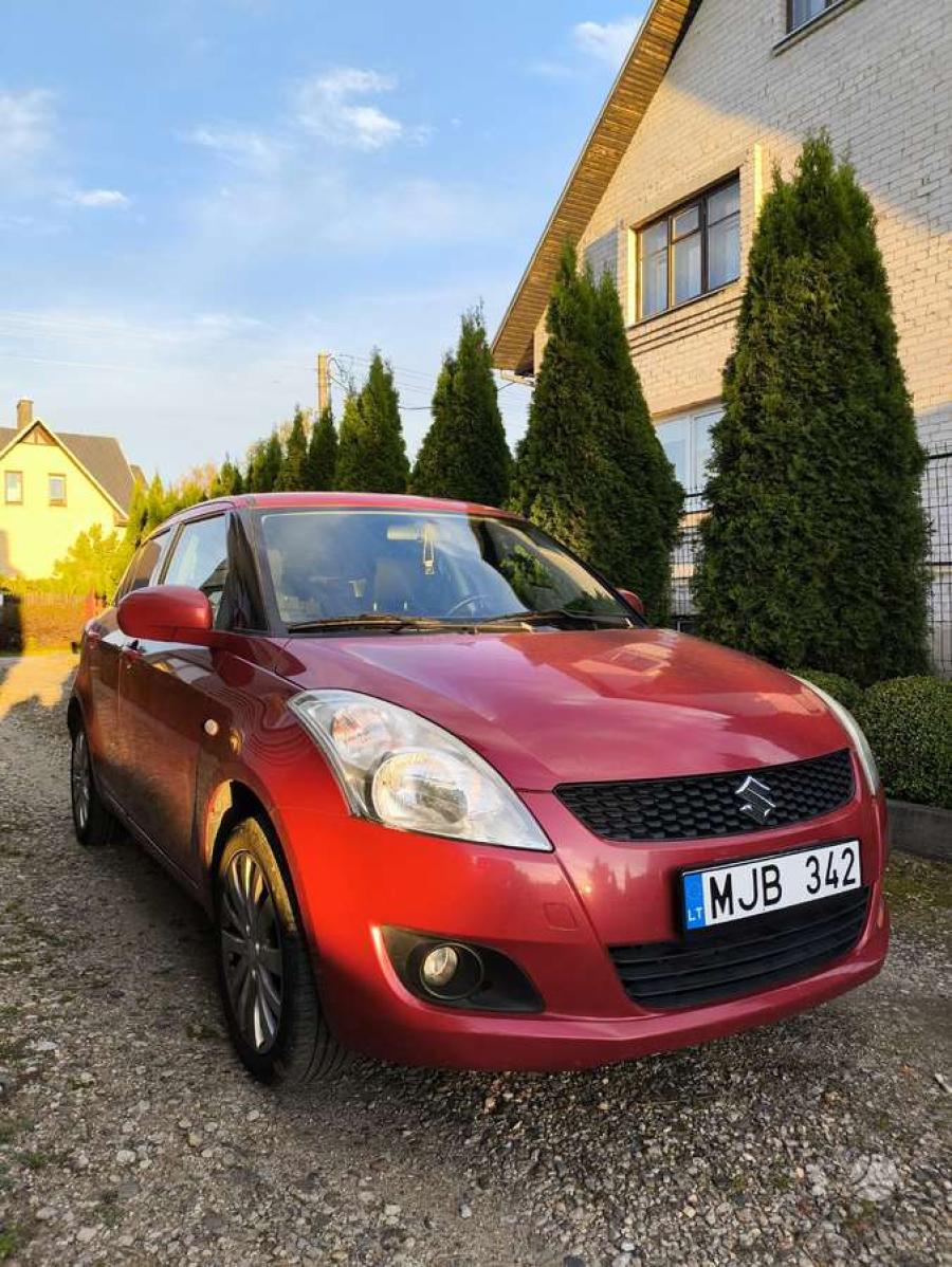 Red Suzuki Swift 2011 in Panevezys, with an engine capacity of 1.24 L and mileage of 287 thousand km for 1650 €, photo 1 on AUTOMOTO.COM.LV