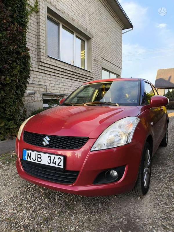 Red Suzuki Swift 2011 in Panevezys, with an engine capacity of 1.24 L and mileage of 287 thousand km for 1650 €, photo 2 on AUTOMOTO.COM.LV