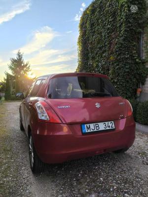 Red Suzuki Swift 2011 in Panevezys, with an engine capacity of 1.24 L and mileage of 287 thousand km for 1650 €, photo 4 on AUTOMOTO.COM.LV