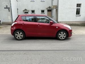 Sarkans Suzuki Swift 2011 Rīga, ar dzinēja tilpumu 1.20 L un nobraukumu 231 tūkst. km par 1964 €, foto 7 vietnē AUTOMOTO.COM.LV