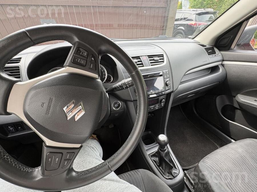 Sarkans Suzuki Swift 2011 Rīga, ar dzinēja tilpumu 1.20 L un nobraukumu 231 tūkst. km par 1964 €, foto 14 vietnē AUTOMOTO.COM.LV