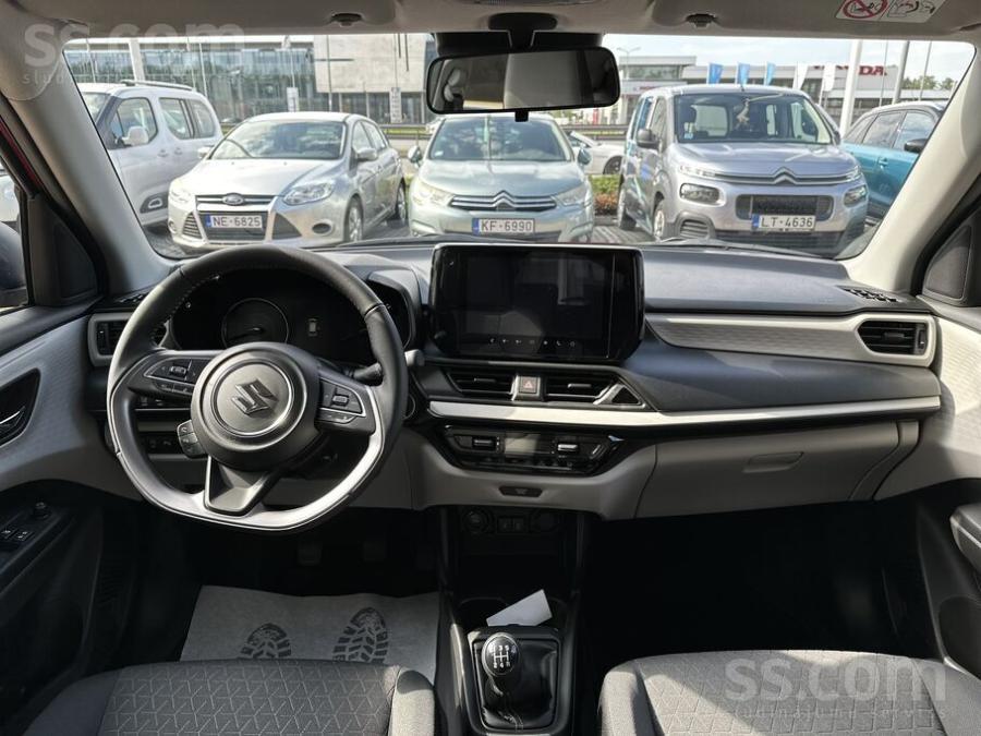 Red Suzuki Swift 2026 in Riga, with an engine capacity of 1.20 L and mileage of 10 thousand km for 19539 €, photo 9 on AUTOMOTO.COM.LV