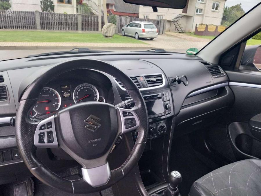 Violet Suzuki Swift 2015 in Marijampole, with an engine capacity of 1.24 L and mileage of 139 thousand km for 5650 €, photo 9 on AUTOMOTO.COM.LV
