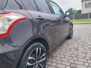 Violet Suzuki Swift 2015 in Marijampole, with an engine capacity of 1.24 L and mileage of 139 thousand km for 5650 €, photo 15 on AUTOMOTO.COM.LV