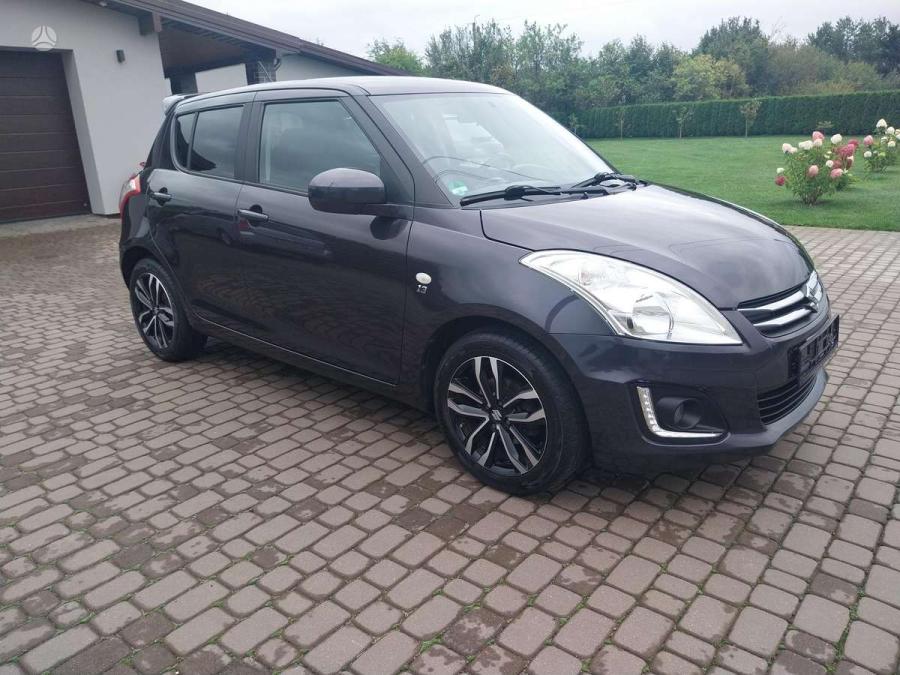 Violet Suzuki Swift 2015 in Marijampole, with an engine capacity of 1.24 L and mileage of 139 thousand km for 5650 €, photo 19 on AUTOMOTO.COM.LV