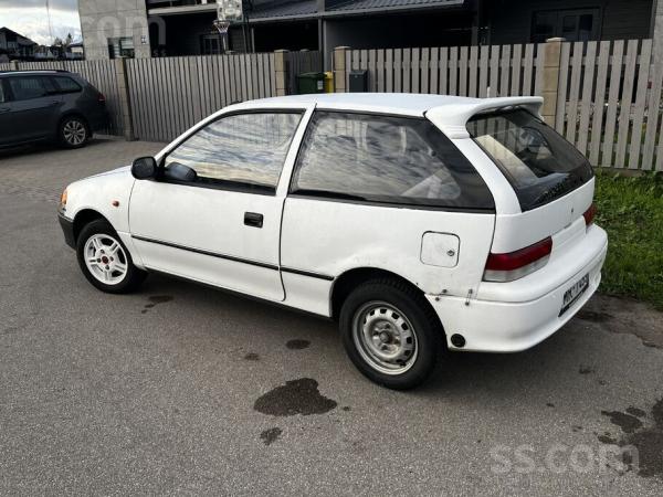 Сузуки Свифт 2002 в Рига на AUTOMOTO.COM.LV Белый Сузуки Свифт 2002 в Рига, объемом двигателя 1.00 л и пробегом 147 тыс. км за 1400 €, фото 5 на AUTOMOTO.COM.LV