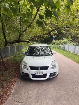 White Suzuki Swift 2009 in Vilnius, with an engine capacity of 1.59 L and mileage of 220 thousand km for 2100 €, photo 4 on AUTOMOTO.COM.LV