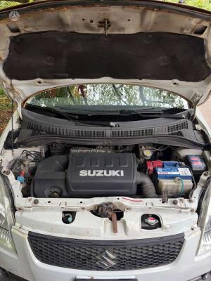 White Suzuki Swift 2009 in Vilnius, with an engine capacity of 1.59 L and mileage of 220 thousand km for 2100 €, photo 11 on AUTOMOTO.COM.LV