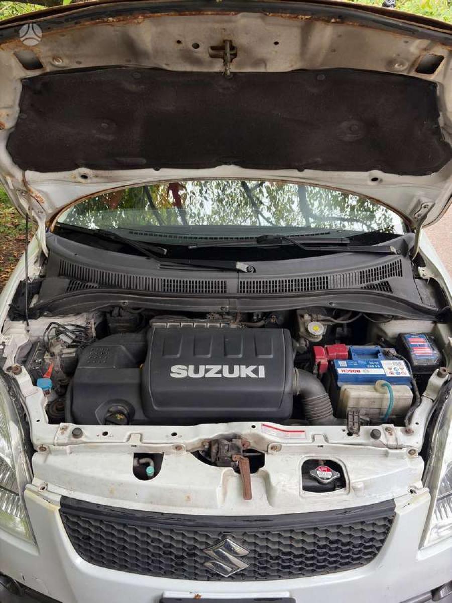 White Suzuki Swift 2009 in Vilnius, with an engine capacity of 1.59 L and mileage of 220 thousand km for 2100 €, photo 11 on AUTOMOTO.COM.LV