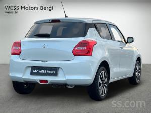 White Suzuki Swift 2018 in Riga, with an engine capacity of 1.20 L and mileage of 113 thousand km for 9990 €, photo 2 on AUTOMOTO.COM.LV