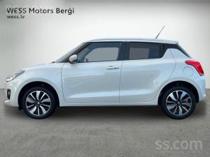 White Suzuki Swift 2018 in Riga, with an engine capacity of 1.20 L and mileage of 113 thousand km for 9990 €, photo 3 on AUTOMOTO.COM.LV
