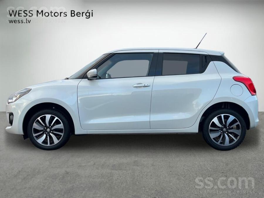 White Suzuki Swift 2018 in Riga, with an engine capacity of 1.20 L and mileage of 113 thousand km for 9990 €, photo 3 on AUTOMOTO.COM.LV