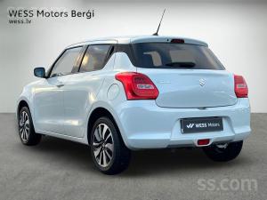 White Suzuki Swift 2018 in Riga, with an engine capacity of 1.20 L and mileage of 113 thousand km for 9990 €, photo 22 on AUTOMOTO.COM.LV