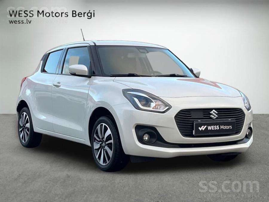 White Suzuki Swift 2018 in Riga, with an engine capacity of 1.20 L and mileage of 113 thousand km for 9990 €, photo 23 on AUTOMOTO.COM.LV