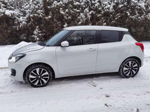 White Suzuki Swift 2018 in Kaunas, with an engine capacity of 1.24 L and mileage of 114 thousand km for 4500 €, photo 2 on AUTOMOTO.COM.LV