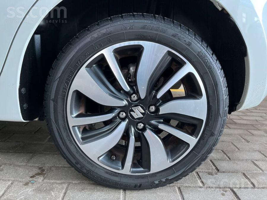White Suzuki Swift 2018 in Riga, with an engine capacity of 1.20 L and mileage of 113 thousand km for 9200 €, photo 16 on AUTOMOTO.COM.LV