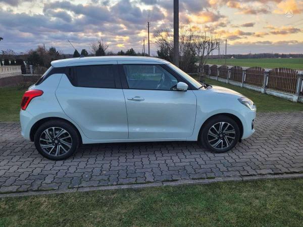 White Suzuki Swift 2022 in Raseiniai, with an engine capacity of 1.20 L and mileage of 45 thousand km for 13500 €, photo 3 on AUTOMOTO.COM.LV
