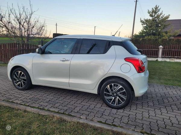 White Suzuki Swift 2022 in Raseiniai, with an engine capacity of 1.20 L and mileage of 45 thousand km for 13500 €, photo 6 on AUTOMOTO.COM.LV