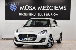 White Suzuki Swift 2024 in Riga, with an engine capacity of 1.20 L and mileage of 46 thousand km for 14590 €, photo  on AUTOMOTO.COM.LV