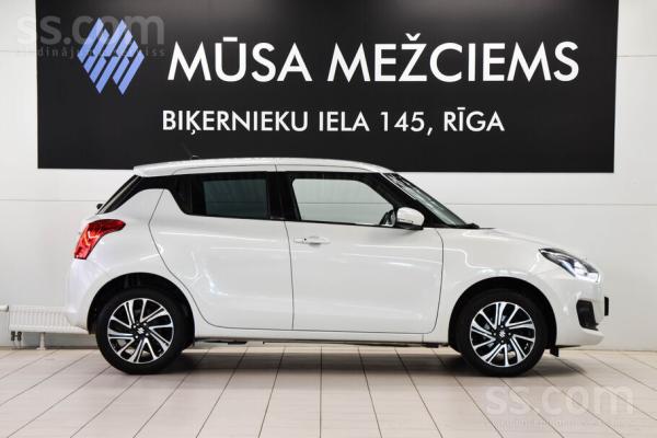 White Suzuki Swift 2024 in Riga, with an engine capacity of 1.20 L and mileage of 46 thousand km for 14590 €, photo 4 on AUTOMOTO.COM.LV