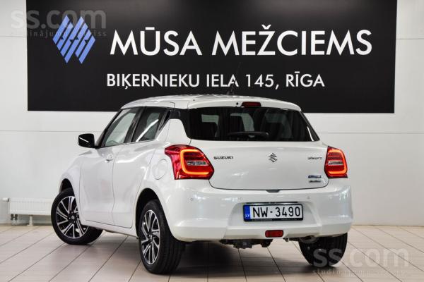 White Suzuki Swift 2024 in Riga, with an engine capacity of 1.20 L and mileage of 46 thousand km for 14590 €, photo 6 on AUTOMOTO.COM.LV
