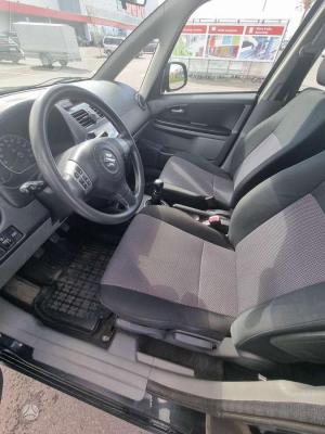 Black Suzuki SX4 2007 in Panevezys, with an engine capacity of 1.59 L and mileage of 143 thousand km for 2100 €, photo 9 on AUTOMOTO.COM.LV