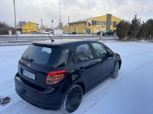Melns Suzuki SX4 2010 Tauragė, ar dzinēja tilpumu 1.59 L un nobraukumu 194 tūkst. km par 2500 €, foto 7 vietnē AUTOMOTO.COM.LV
