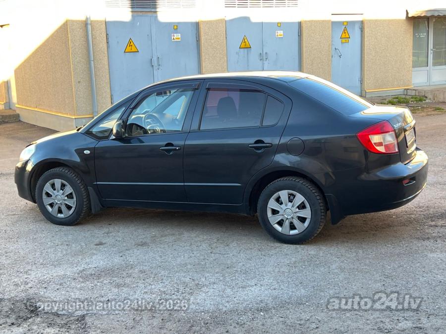 Melns Suzuki SX4 2007 Narva, ar dzinēja tilpumu 1.60 L un nobraukumu 279 tūkst. km par 1499 €, foto 10 vietnē AUTOMOTO.COM.LV