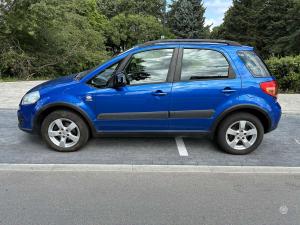 Blue Suzuki SX4 2013 in Panevezys, with an engine capacity of 1.96 L and mileage of 180 thousand km for 5100 €, photo 3 on AUTOMOTO.COM.LV