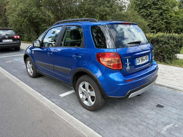 Blue Suzuki SX4 2013 in Panevezys, with an engine capacity of 1.96 L and mileage of 180 thousand km for 5100 €, photo 3 on AUTOMOTO.COM.LV