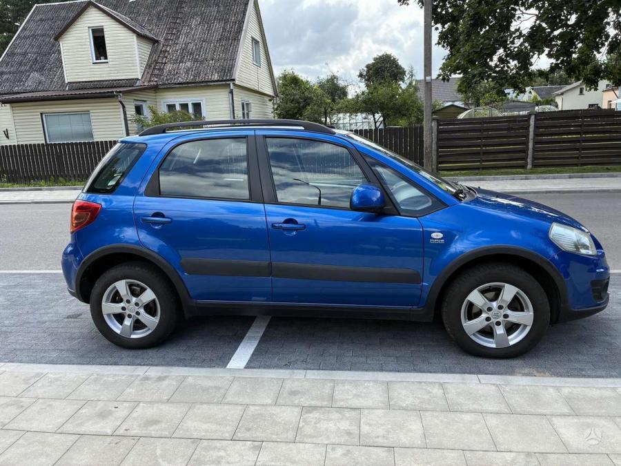 Blue Suzuki SX4 2013 in Panevezys, with an engine capacity of 1.96 L and mileage of 180 thousand km for 5100 €, photo 7 on AUTOMOTO.COM.LV