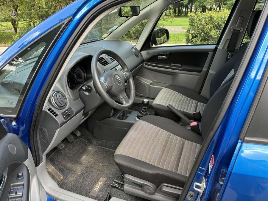 Blue Suzuki SX4 2013 in Panevezys, with an engine capacity of 1.96 L and mileage of 180 thousand km for 5100 €, photo 11 on AUTOMOTO.COM.LV