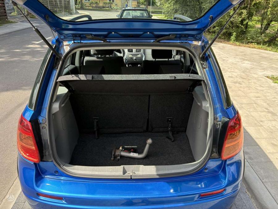 Blue Suzuki SX4 2013 in Panevezys, with an engine capacity of 1.96 L and mileage of 180 thousand km for 5100 €, photo 15 on AUTOMOTO.COM.LV