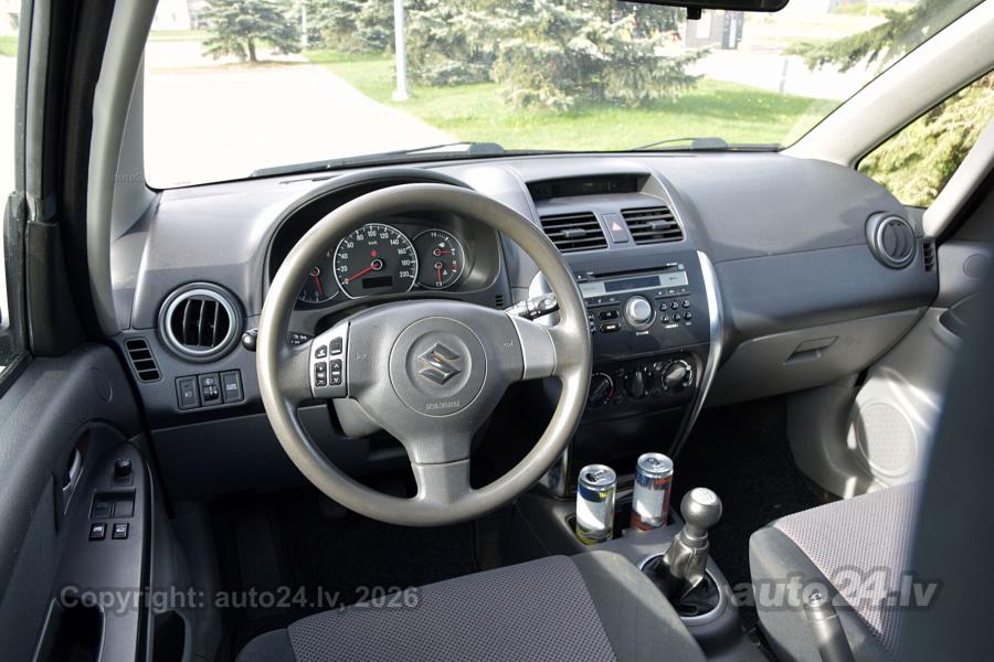 Zils Suzuki SX4 2007 Tartu, ar dzinēja tilpumu 1.60 L un nobraukumu 214 tūkst. km par 2999 €, foto 14 vietnē AUTOMOTO.COM.LV
