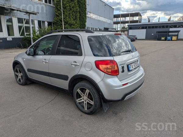 Grey Suzuki SX4 2012 in Riga, with an engine capacity of 1.60 L and mileage of 222 thousand km for 3900 €, photo 4 on AUTOMOTO.COM.LV