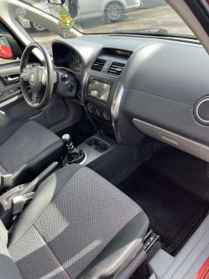 Oranžs Suzuki SX4 2007 Utena, ar dzinēja tilpumu 1.90 L un nobraukumu 151 tūkst. km par 2300 €, foto 7 vietnē AUTOMOTO.COM.LV