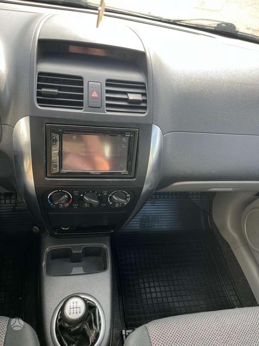 Oranžs Suzuki SX4 2007 Utena, ar dzinēja tilpumu 1.90 L un nobraukumu 151 tūkst. km par 2300 €, foto 14 vietnē AUTOMOTO.COM.LV