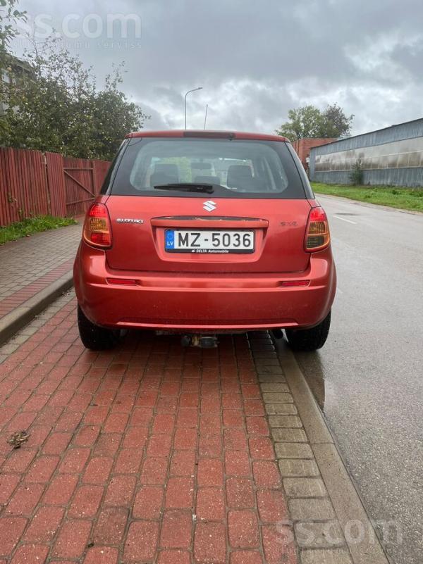 Oranžs Suzuki SX4 2007 Jēkabpils, ar dzinēja tilpumu 1.90 L un nobraukumu 201 tūkst. km par 1550 €, foto 5 vietnē AUTOMOTO.COM.LV