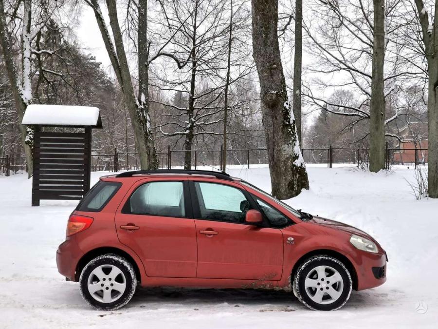 Orange Suzuki SX4 2007 in Vilnius, with an engine capacity of 1.90 L and mileage of 231 thousand km for 1750 €, photo 6 on AUTOMOTO.COM.LV