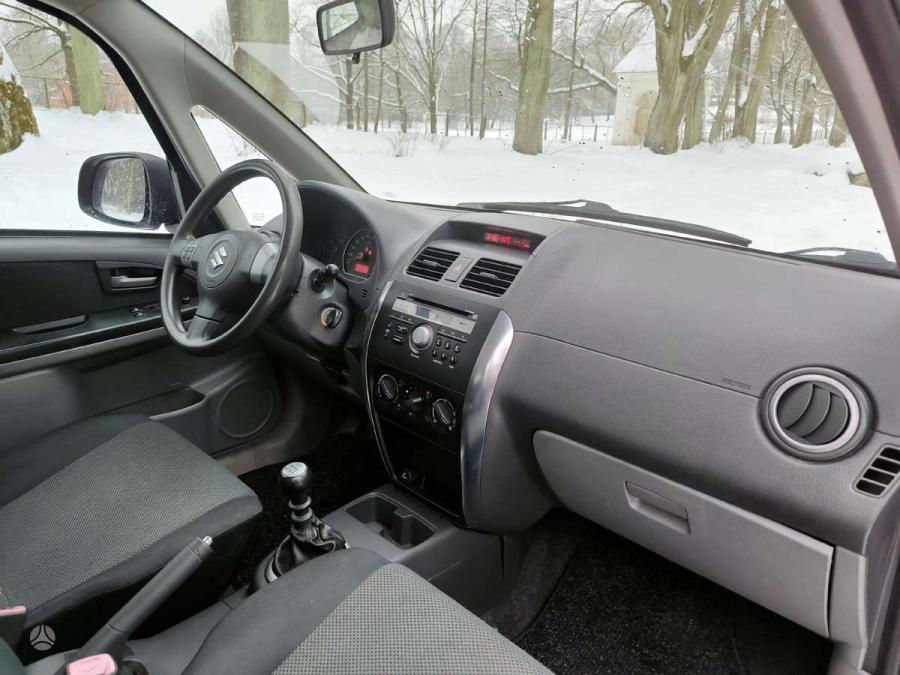 Orange Suzuki SX4 2007 in Vilnius, with an engine capacity of 1.90 L and mileage of 231 thousand km for 1750 €, photo 9 on AUTOMOTO.COM.LV