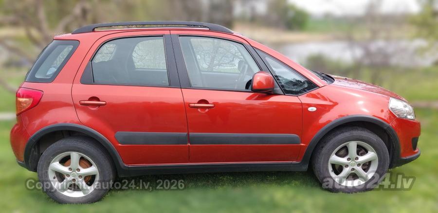 Orange Suzuki SX4 2007 in Tartu, with an engine capacity of 1.60 L and mileage of 164 thousand km for 3100 €, photo 4 on AUTOMOTO.COM.LV