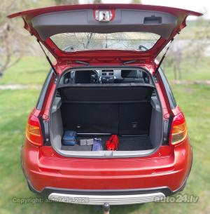 Orange Suzuki SX4 2007 in Tartu, with an engine capacity of 1.60 L and mileage of 164 thousand km for 3100 €, photo 9 on AUTOMOTO.COM.LV