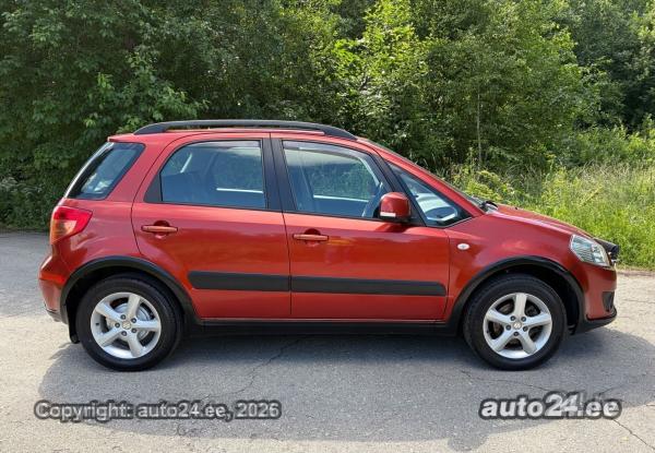 Orange Suzuki SX4 2008 in Tallinn, with an engine capacity of 1.60 L and mileage of 168 thousand km for 2590 €, photo 4 on AUTOMOTO.COM.LV