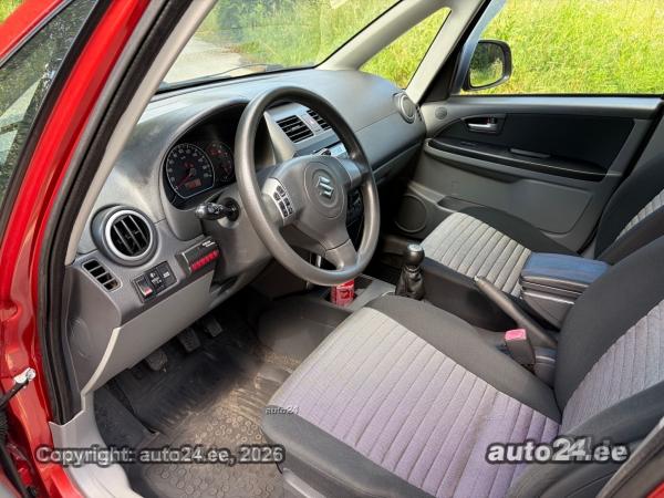 Orange Suzuki SX4 2008 in Tallinn, with an engine capacity of 1.60 L and mileage of 168 thousand km for 2590 €, photo 8 on AUTOMOTO.COM.LV