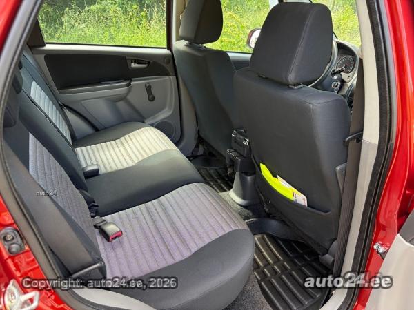 Orange Suzuki SX4 2008 in Tallinn, with an engine capacity of 1.60 L and mileage of 168 thousand km for 2590 €, photo 10 on AUTOMOTO.COM.LV