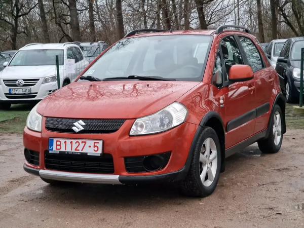 Orange Suzuki SX4 2009 in Grobiņa, with an engine capacity of 1.90 L and mileage of 341 thousand km for 2450 €, photo 1 on AUTOMOTO.COM.LV
